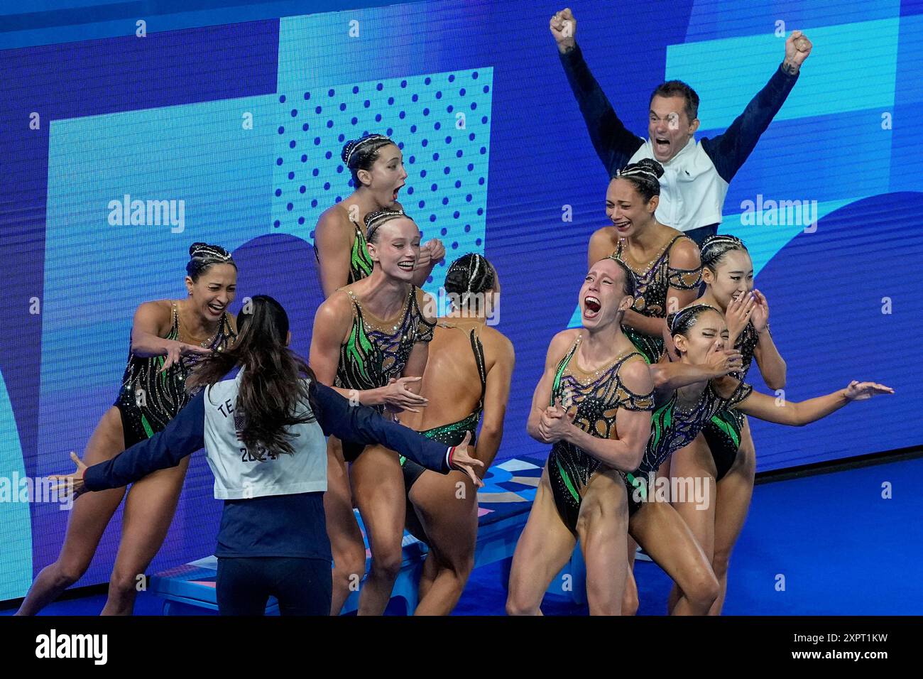 Team USA react after competing in the team acrobatic routine of ...