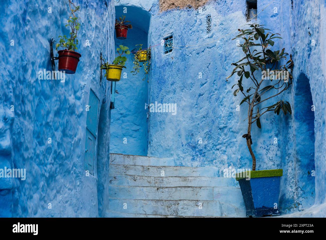Morocco, Chefchaouen, Narrow alley with blue houses and steps Stock ...