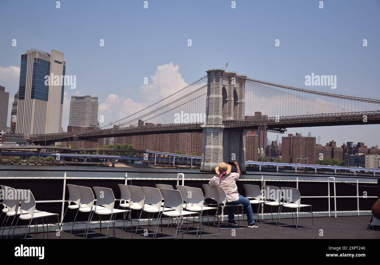 Beautiful View of famous Brooklyn Bridge from ferry over Hudson River ...