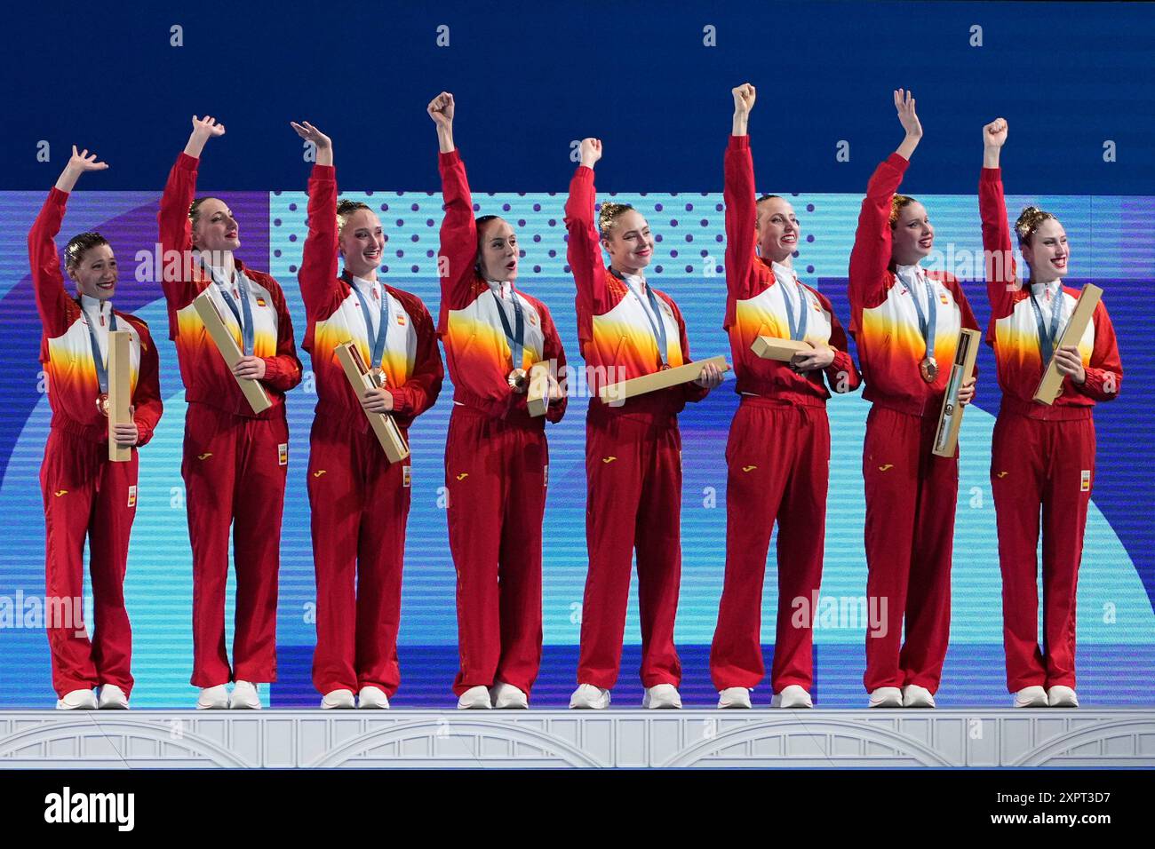 Team Spain wave on the podium after receiving their bronze in the team ...