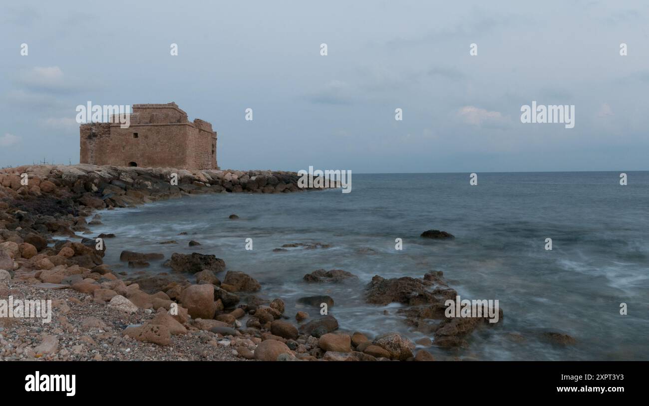 Paphos castle at down. Coastal ancient historic castle landmark at ...