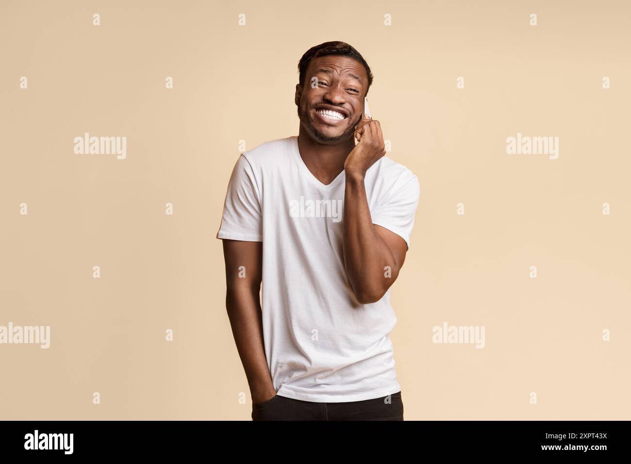 African American Man Laughing Looking At Camera Over Yellow Background ...