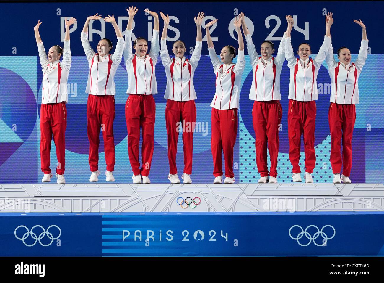 Team China celebrate their gold medal in the team acrobatic routine of ...