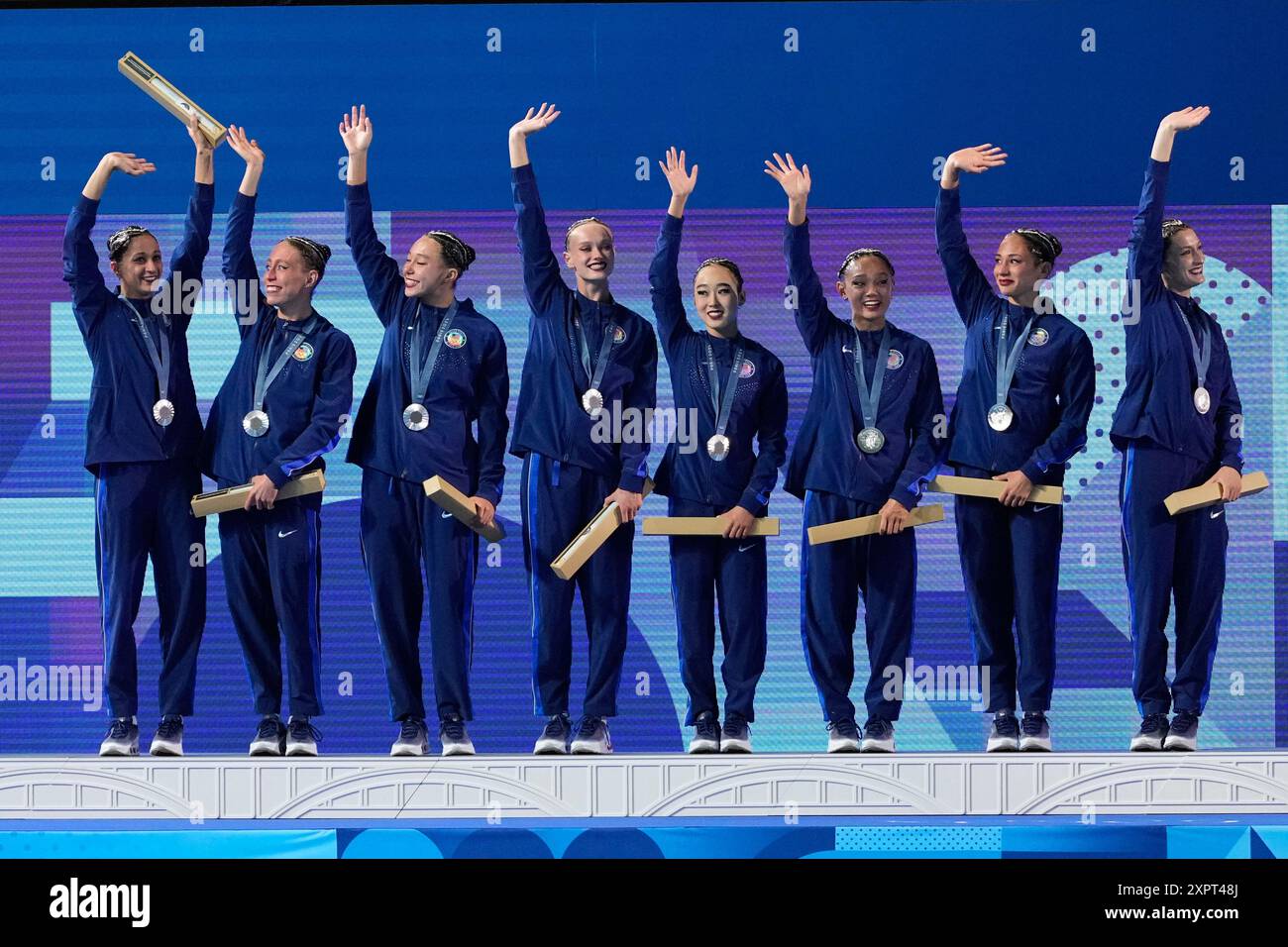 Team USA celebrate their silver medal in the team acrobatic routine of ...