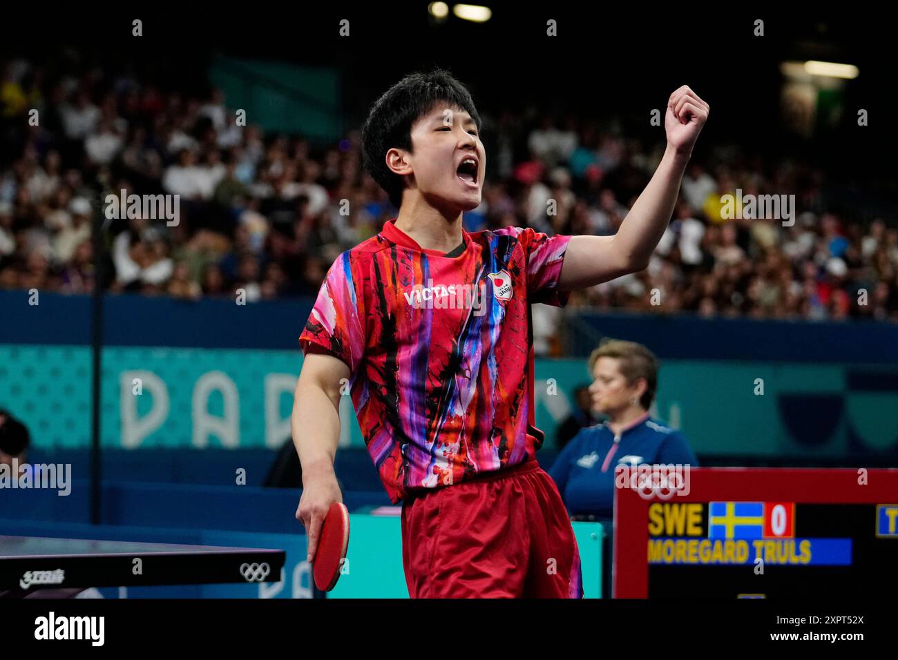 Japan's Tomokazu Harimoto reacts after a winning point against Sweden's ...