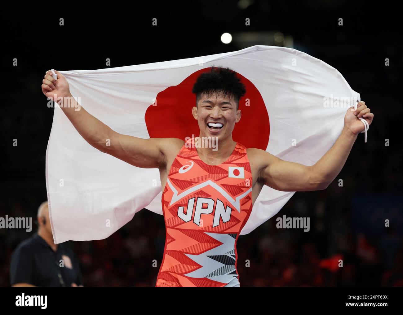 Japan's KUSAKA Nao celebrates after winning the Men's Greco-Roman 77kg ...