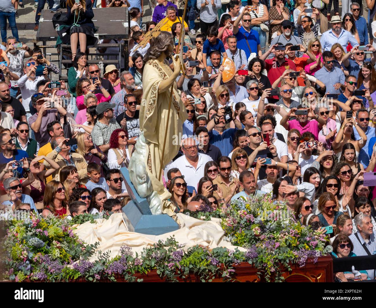 Jesus float over the crowd in Plaza Mayor during the Procession of the ...