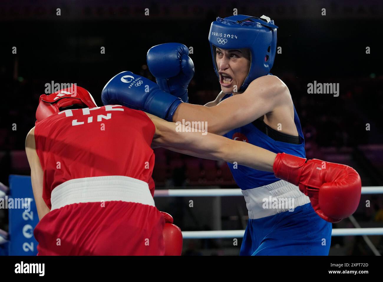 Taiwan's Lin Yu-ting, left, fights Turkey's Esra Yildiz in their women ...