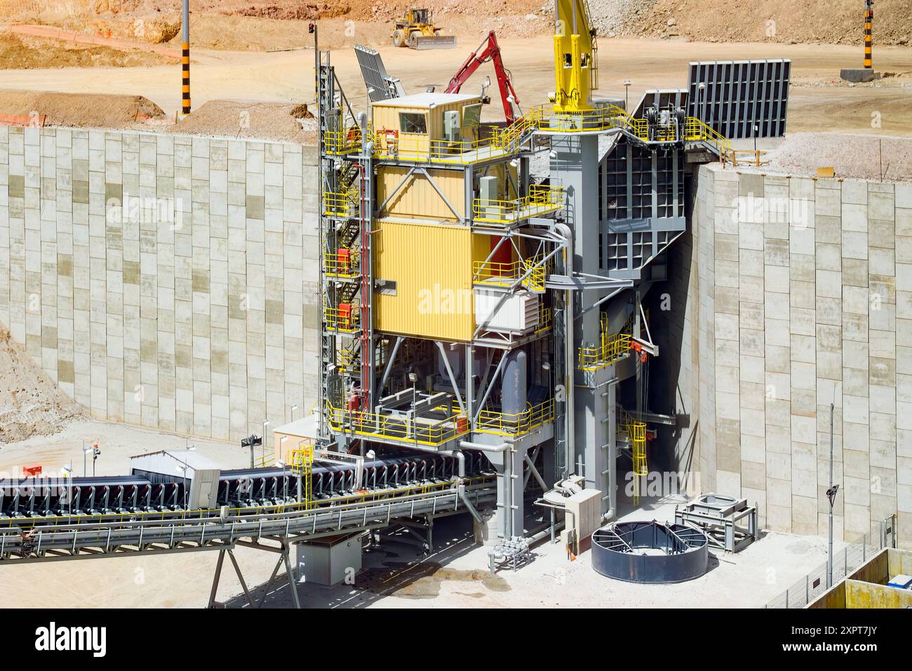Rock crusher and conveyor belt at the plant of a copper mine in the ...