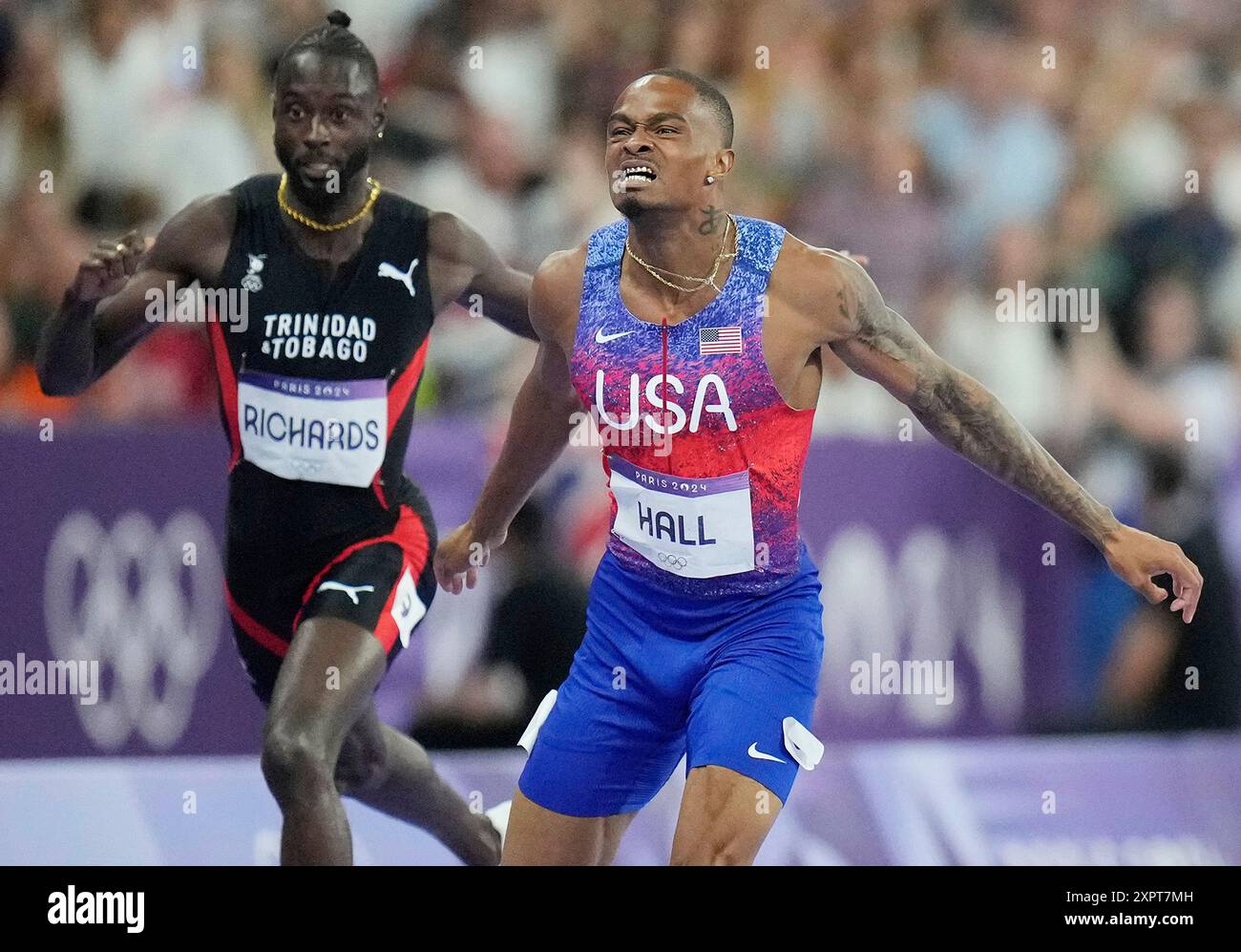 Paris, France. 07th Aug, 2024. Quincy Hall of the U.S. (R) crosses the ...