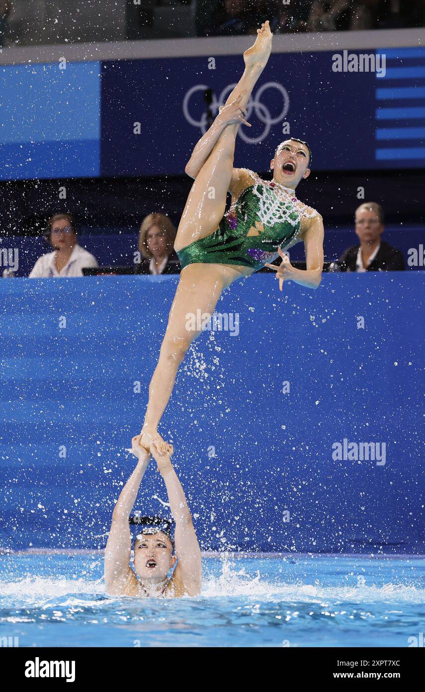 Japan artistic swimming team members perform in the team acrobatic ...