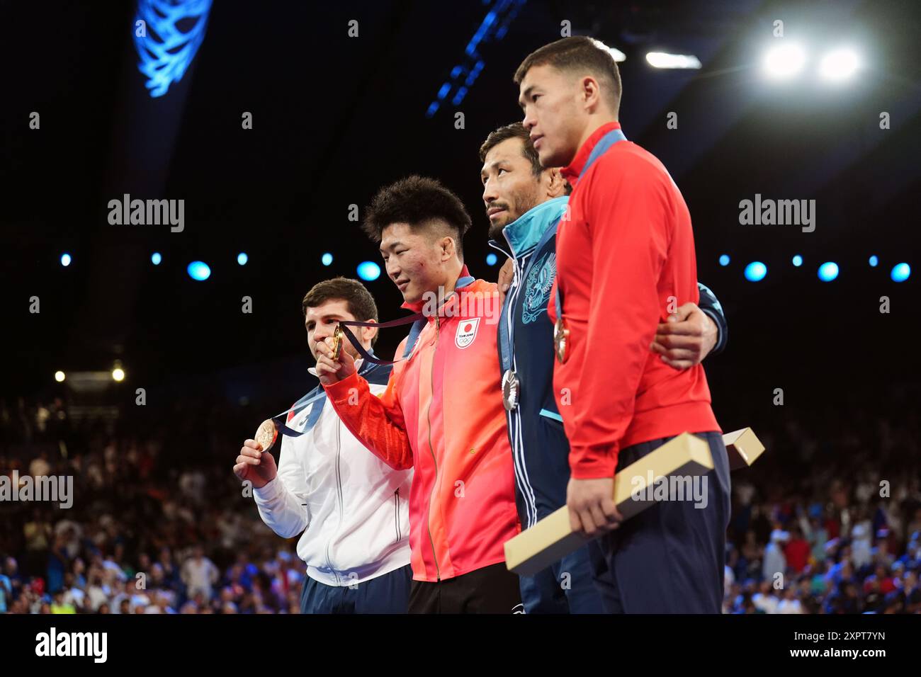 Gold medalist Nao Kusaka of Japan (C), Silver medalist Demeu Zhadrayev ...