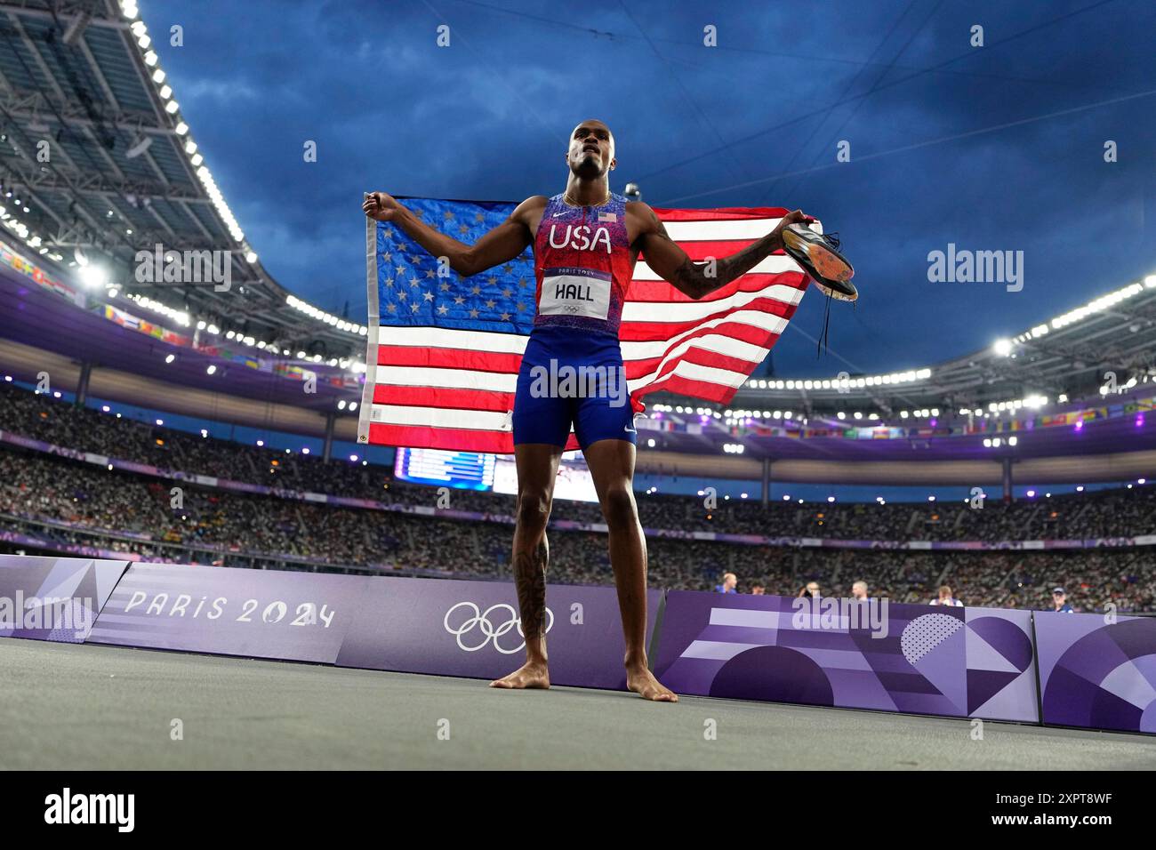 Quincy Hall, of the United States, poses after winning the gold medal ...