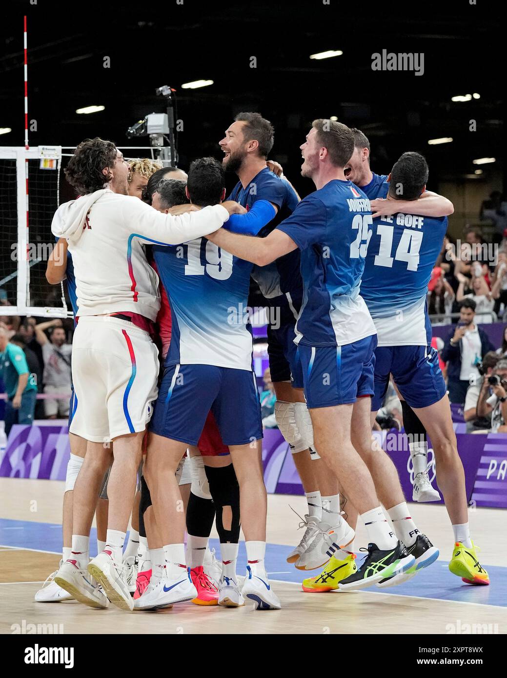 Members of the French team celebrate after beating Italy in a semifinal ...