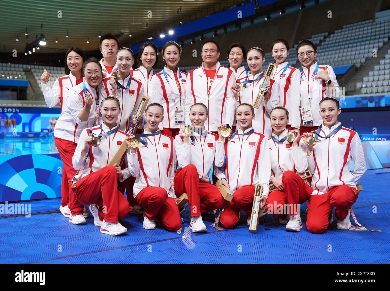 Saint Denis. 7th Aug, 2024. Gold medalists team China show their medals ...