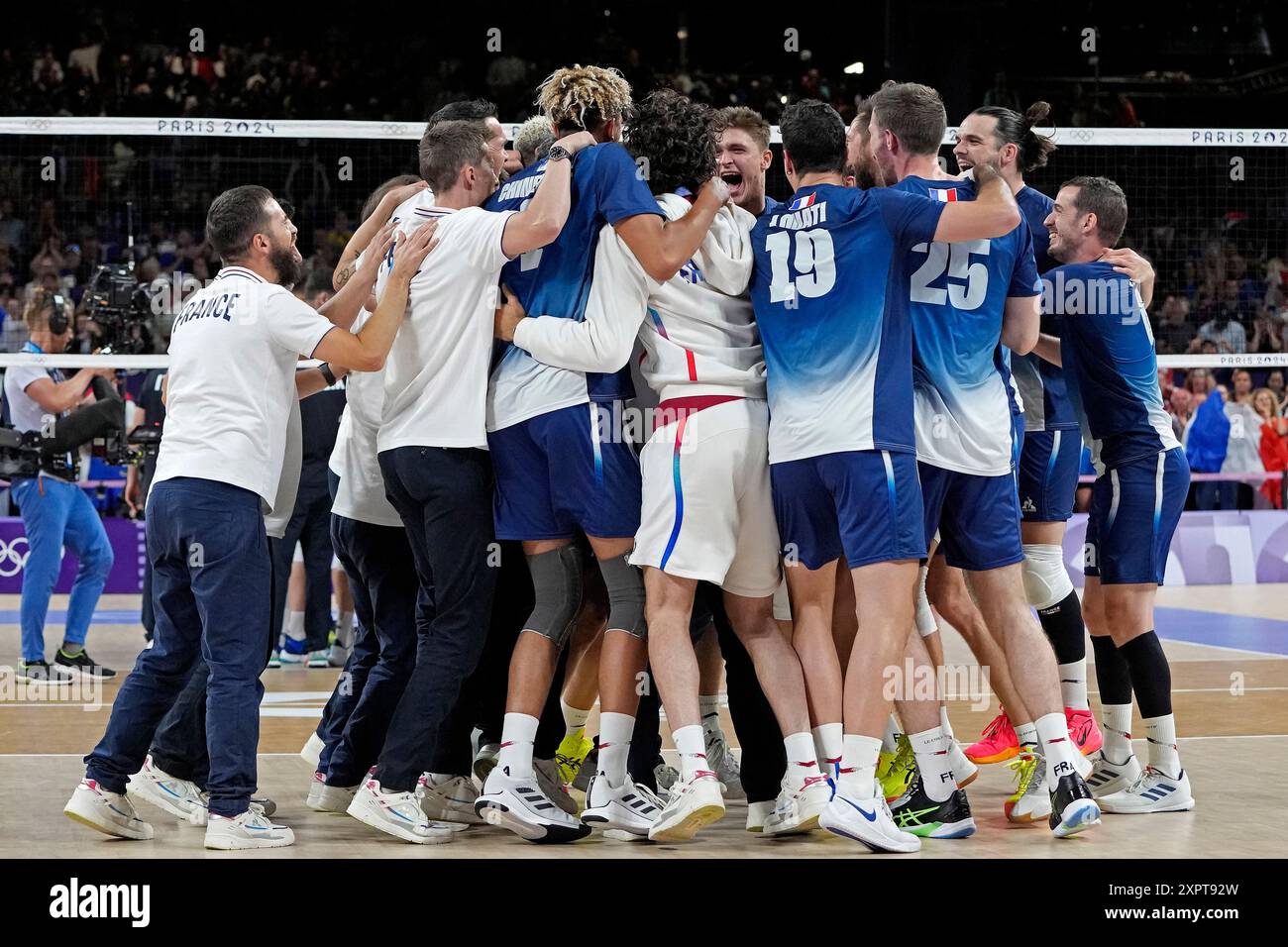 Members of the French team celebrate after beating Italy in a semifinal ...