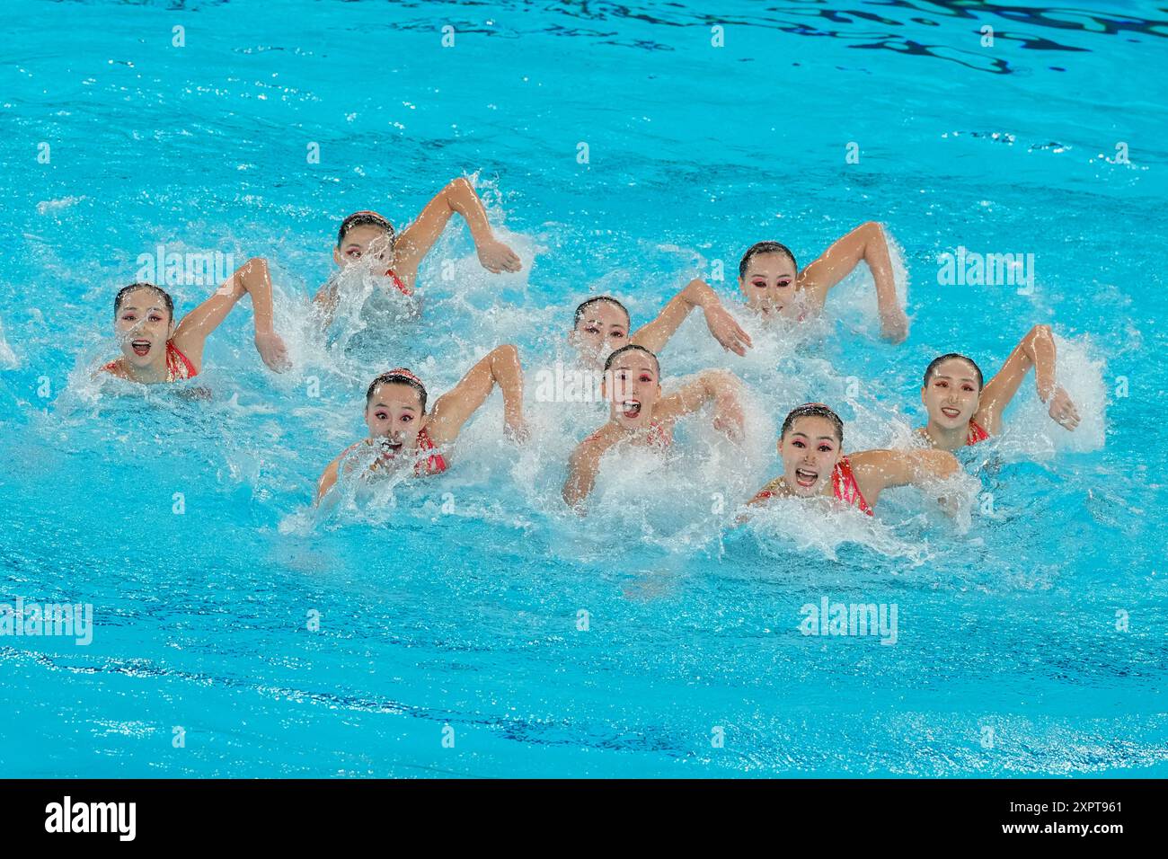 Team China competes in the team acrobatic routine of artistic swimming ...