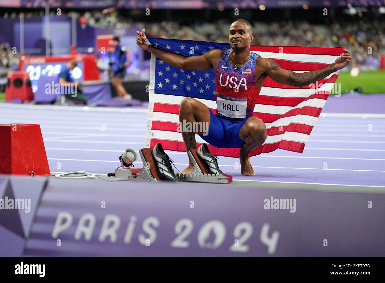 Quincy Hall, of the United States, poses after winning the gold medal ...