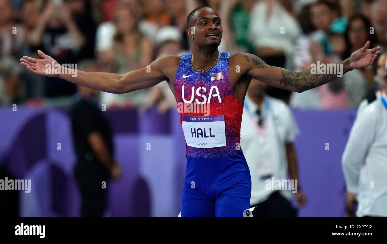 Quincy Hall, of the United States, celebrates winning the men's 400 ...