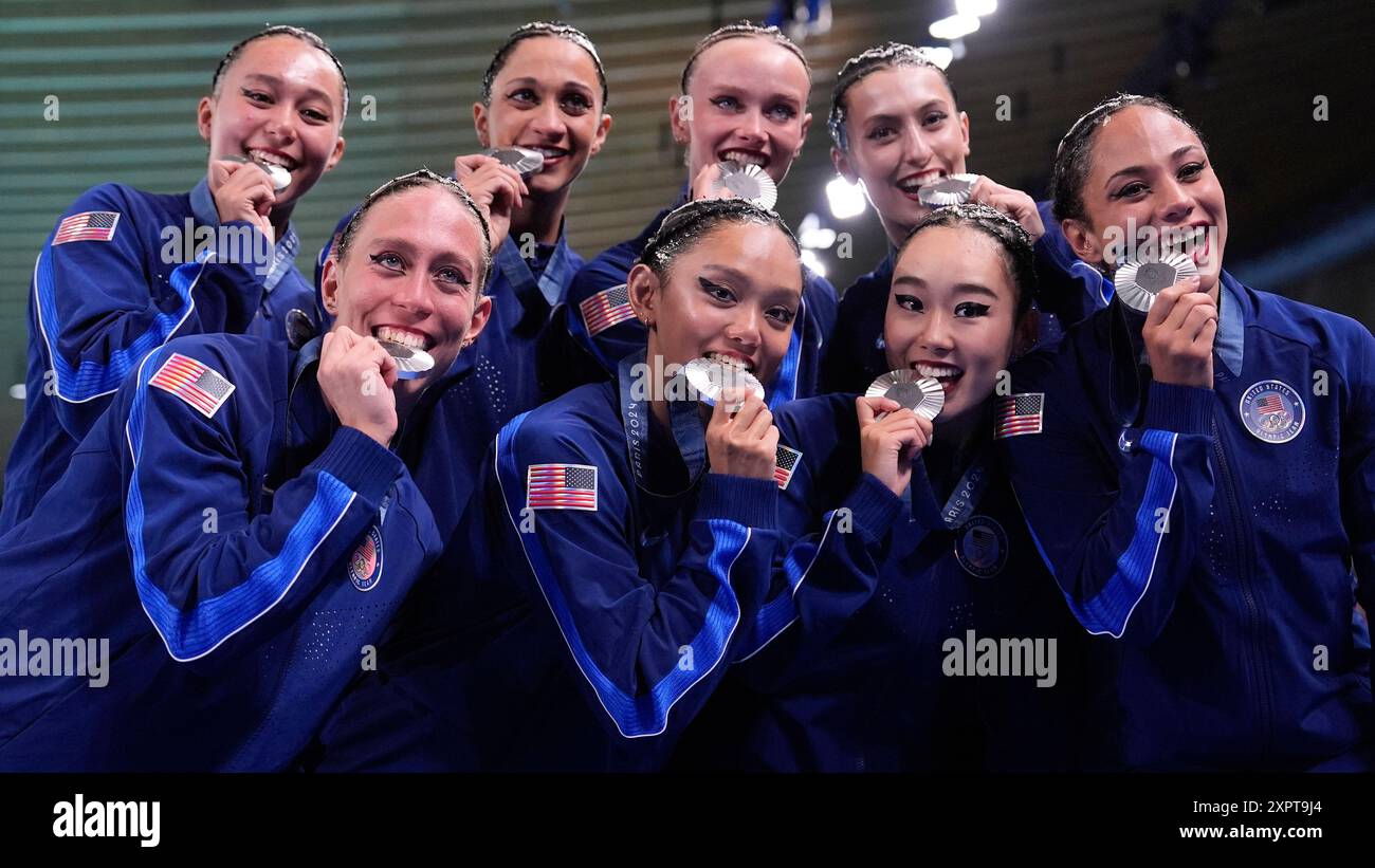 Team USA celebrate their silver medal after the team acrobatic routine ...