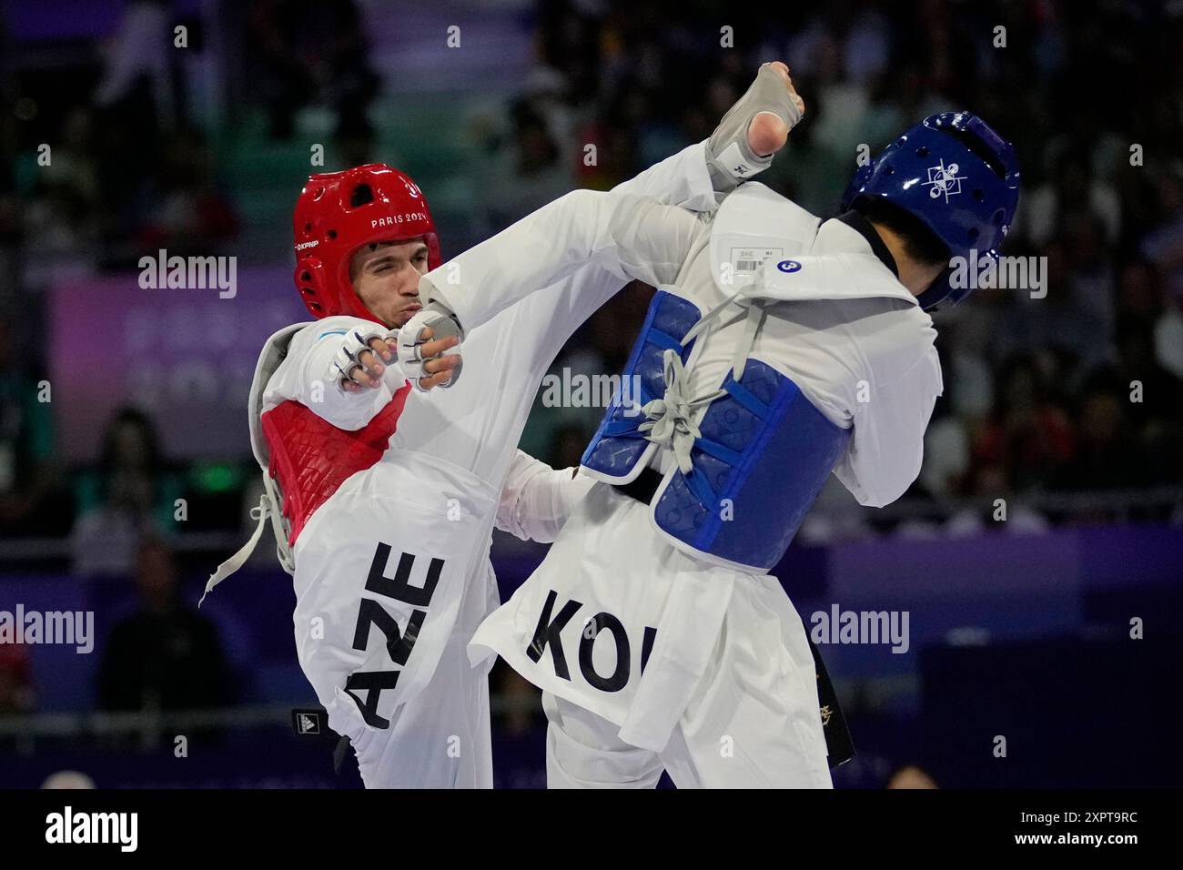 Korea's Taejoon Park competes with Azerbaijan's Gashim Magomedov in a ...