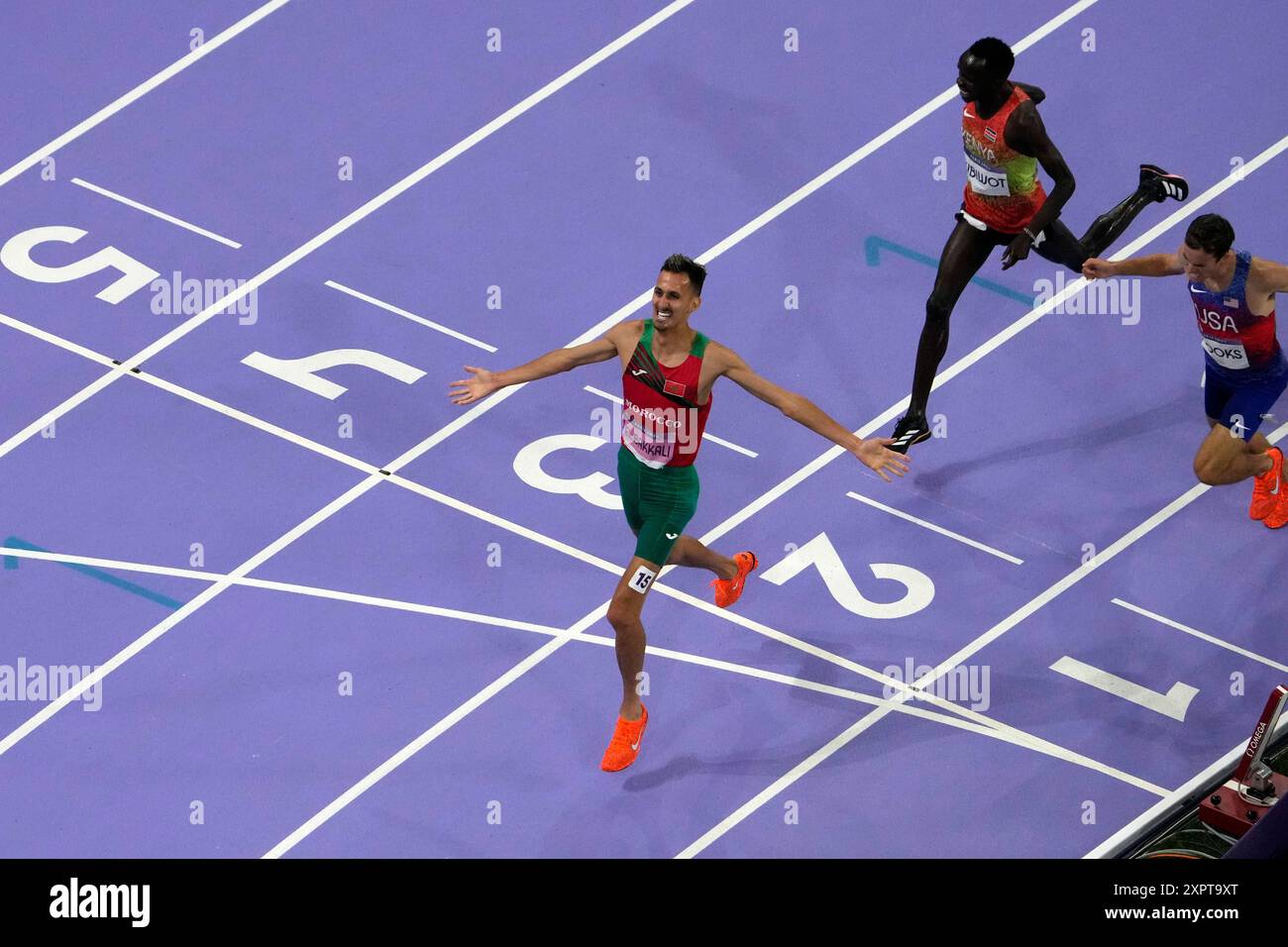 Soufiane El Bakkali (15), of Morocco, wins the men's 3,000-meter ...
