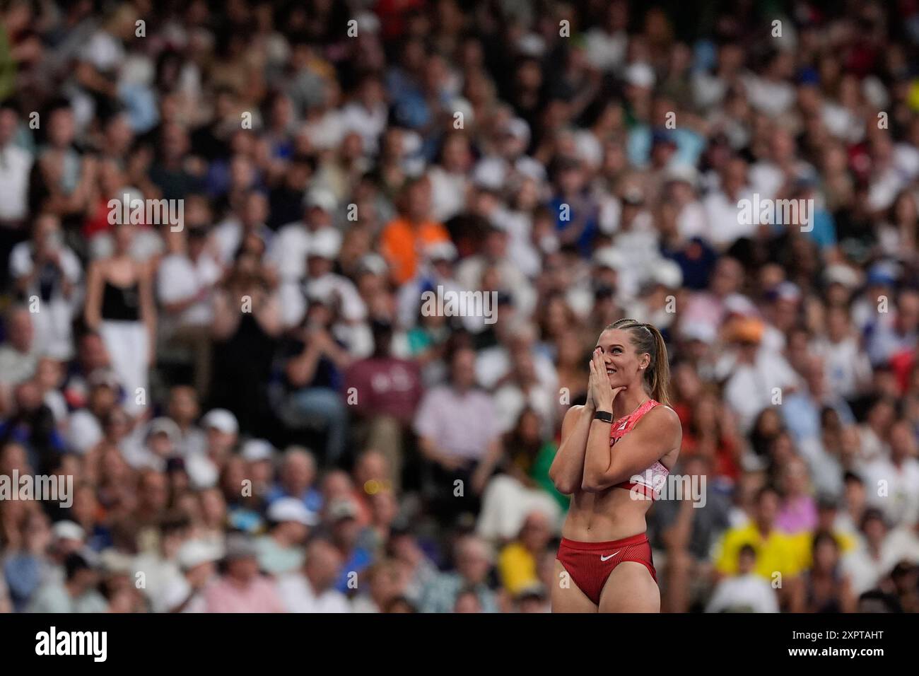 Alysha Newman, of Canada, reacts after a vault as she competes in the ...