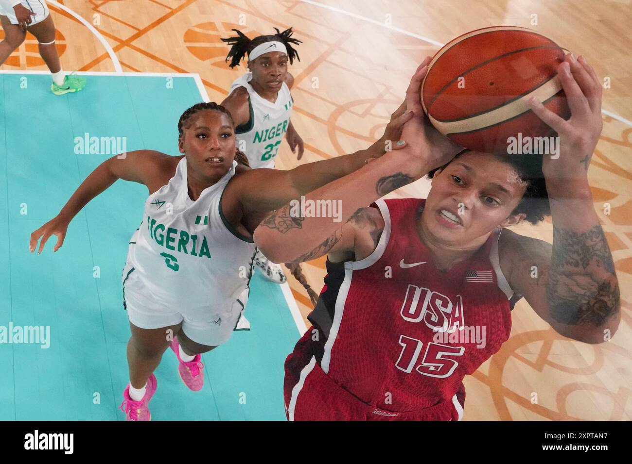 United States' Brittney Griner (15) shoots in front of Lauren Ebo (6 ...
