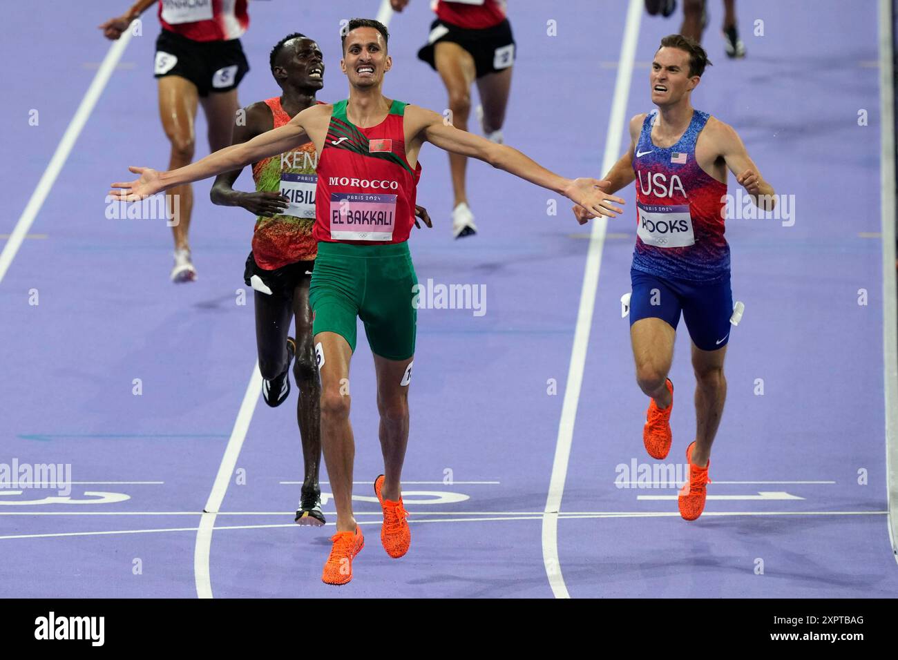 Soufiane El Bakkali, of Morocco, celebrates after winning the men's ...