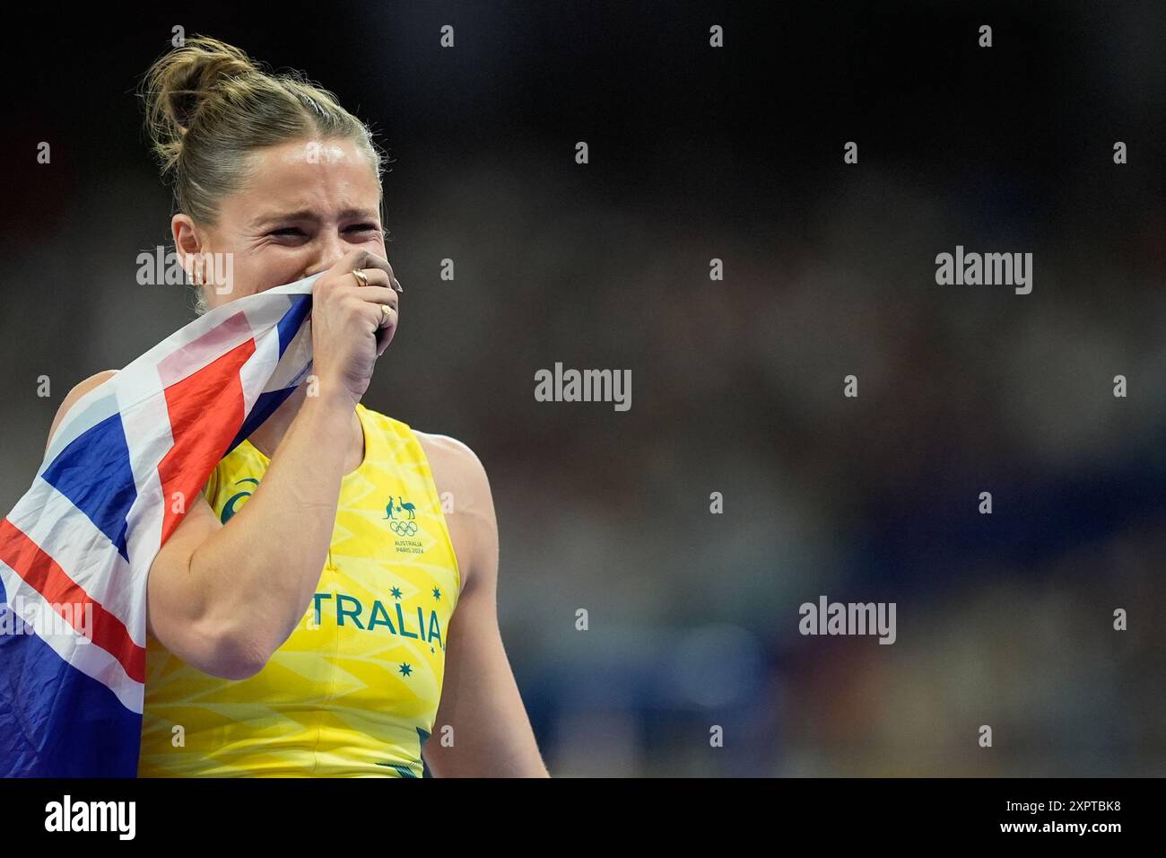 Nina Kennedy, of Australia, reacts after winning the women's pole vault ...