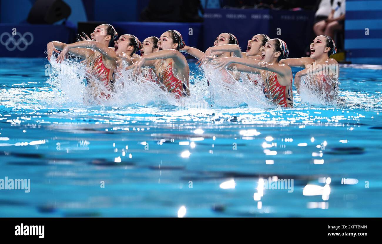 Members of China team perform during an artistic swimming team ...