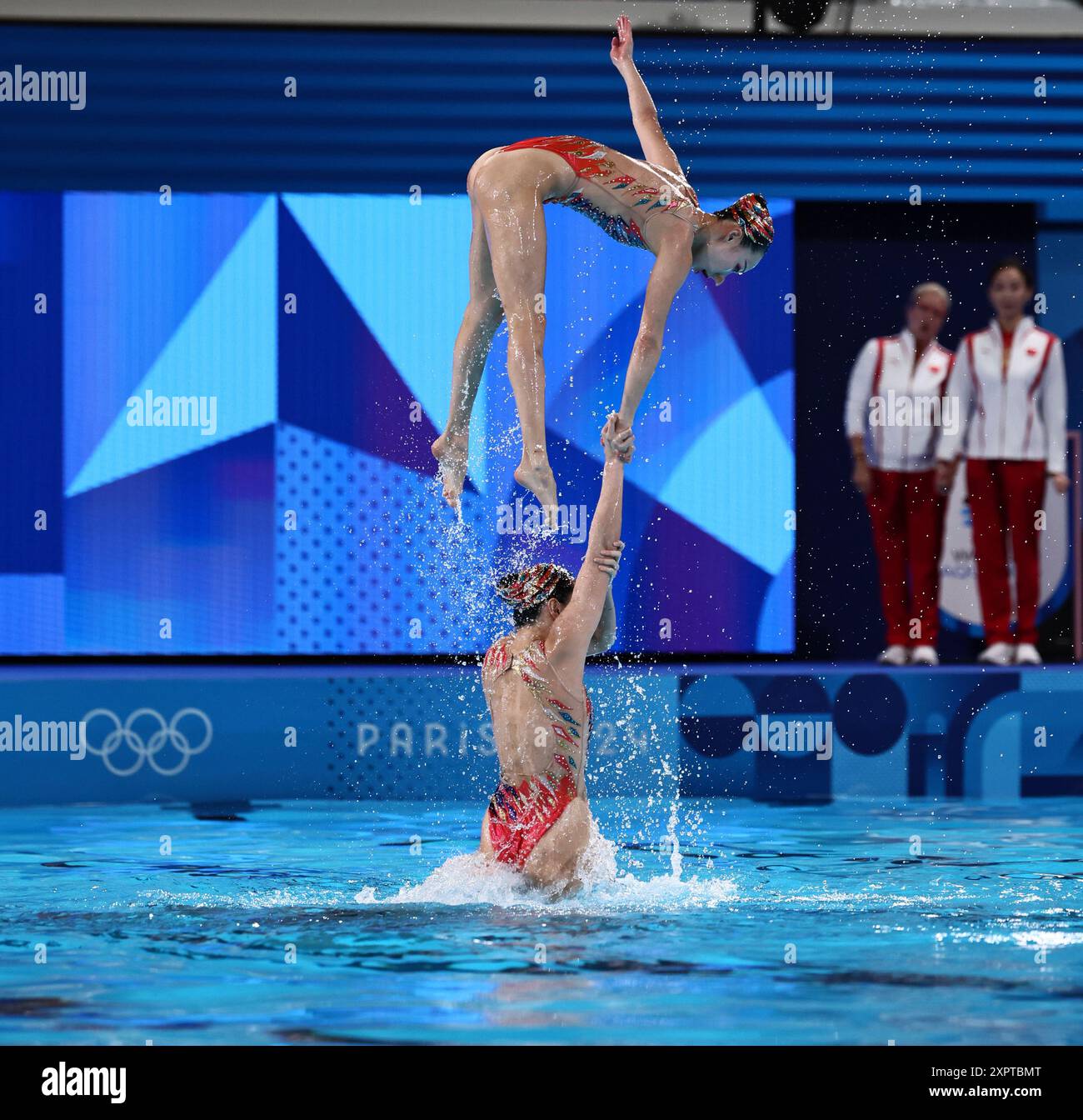Members of China team perform during an artistic swimming team ...