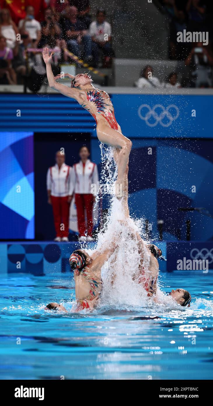 Members of China team perform during an artistic swimming team ...