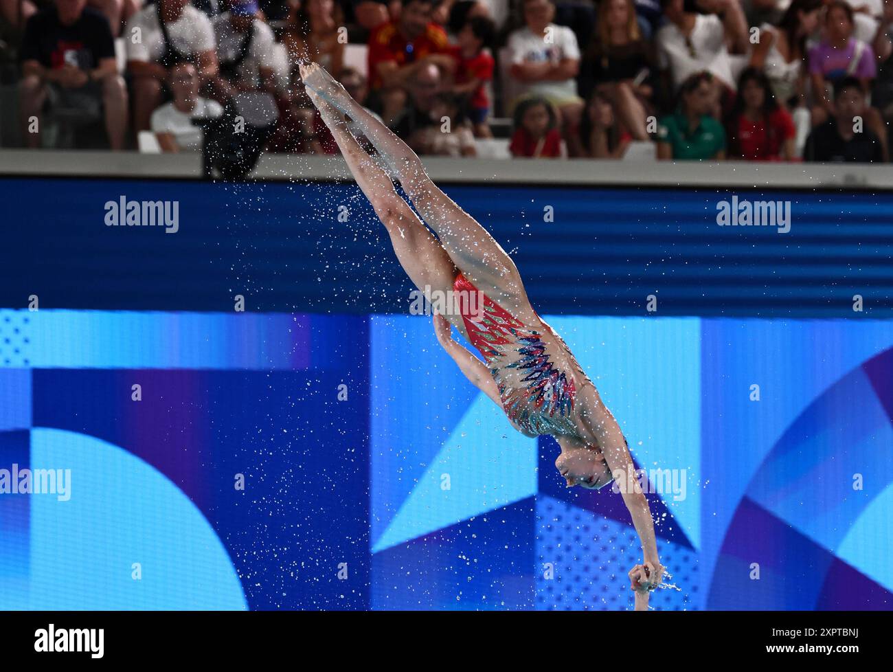 Members of China team perform during an artistic swimming team ...