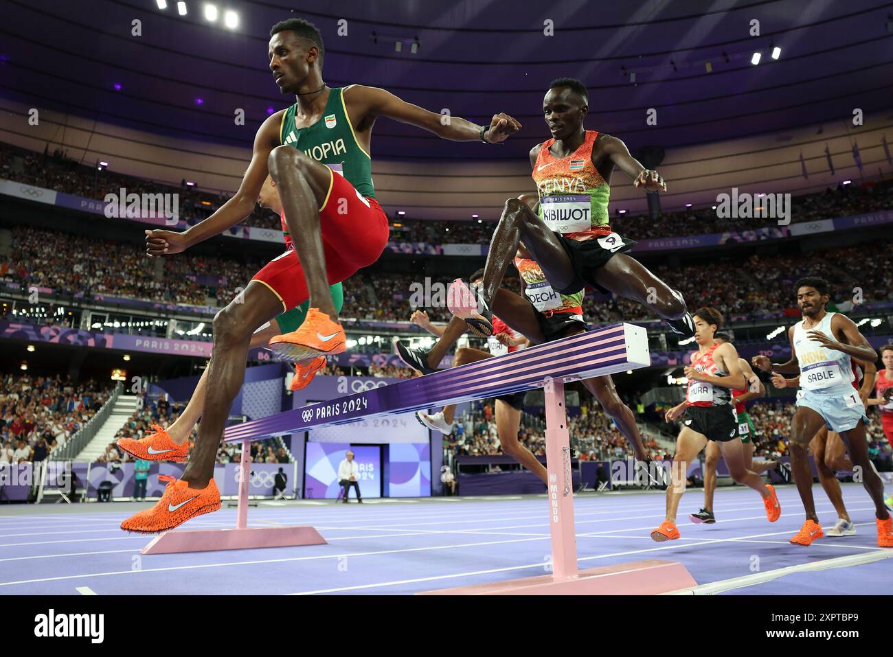 Paris, France. 7th Aug, 2024. Lamecha Girma (front) of Ethiopia ...