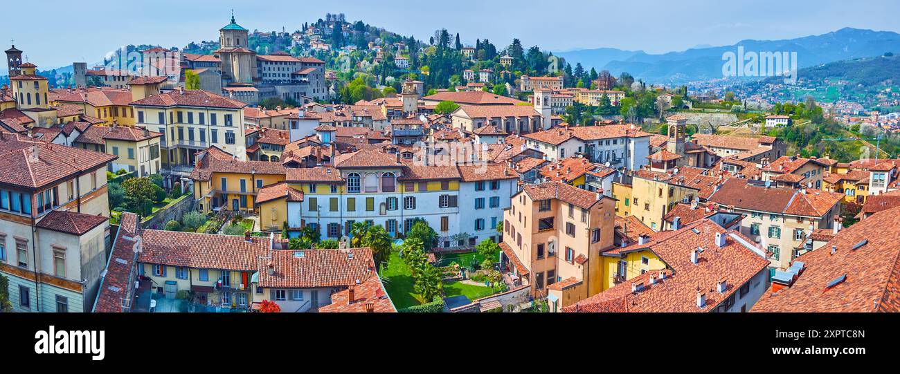 Panorama of the medieval city towers and tile roofs of houses, mansions ...