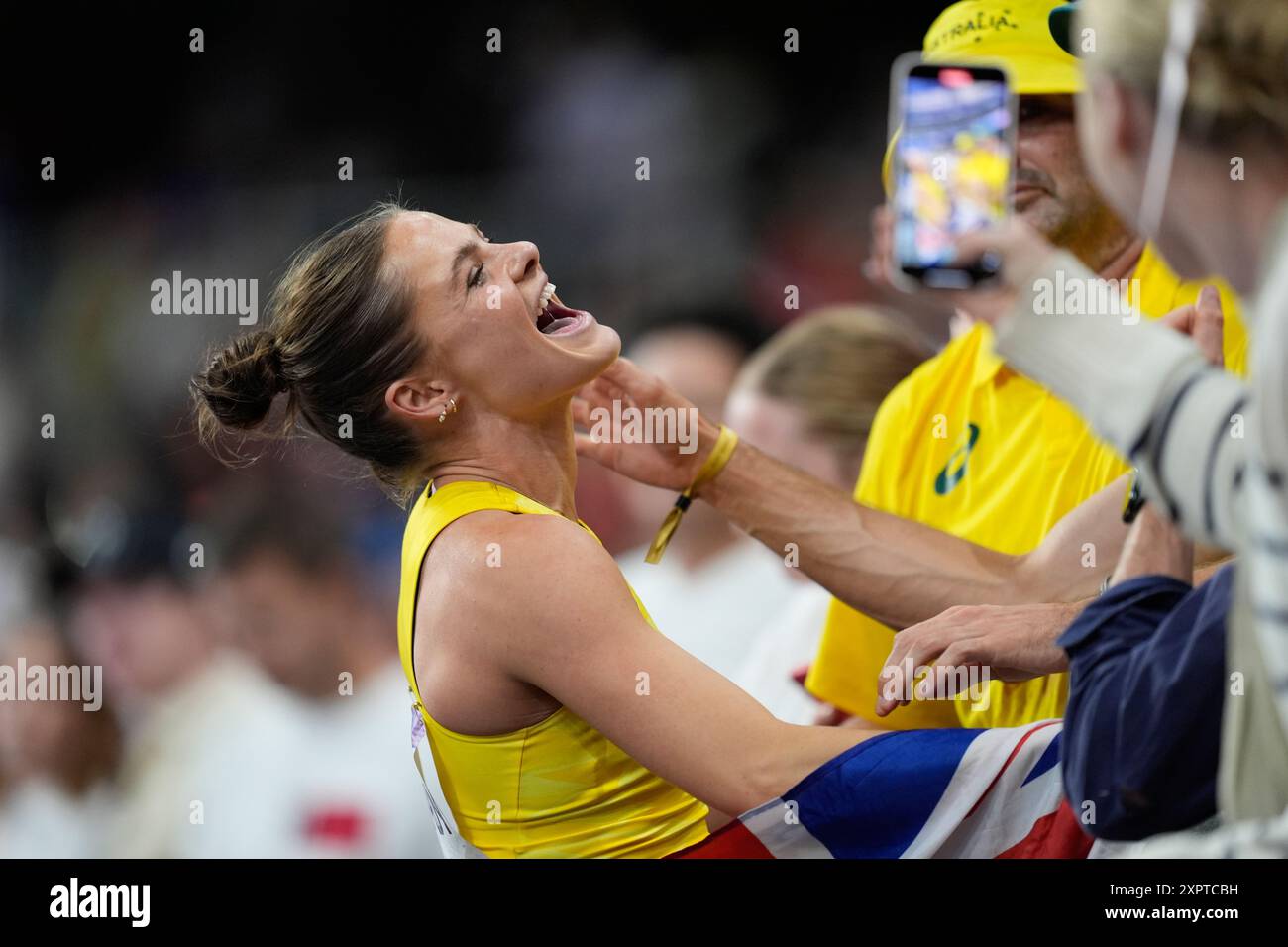 Nina Kennedy, of Australia, reacts after winning the women's pole vault ...