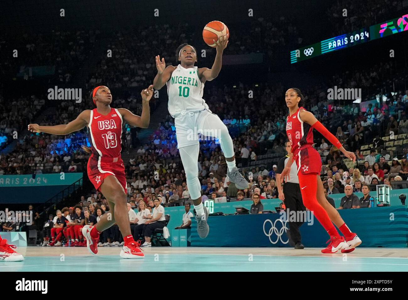 Promise Amukamara (10), of Nigeria, shoots between United States ...