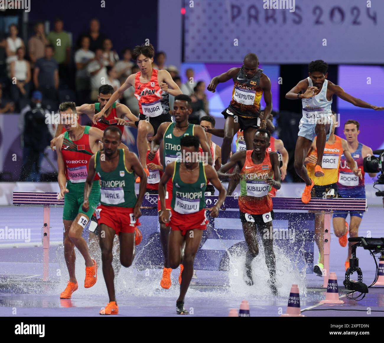 Athletes competes during men's athletics 3000-meter steeplechase final ...