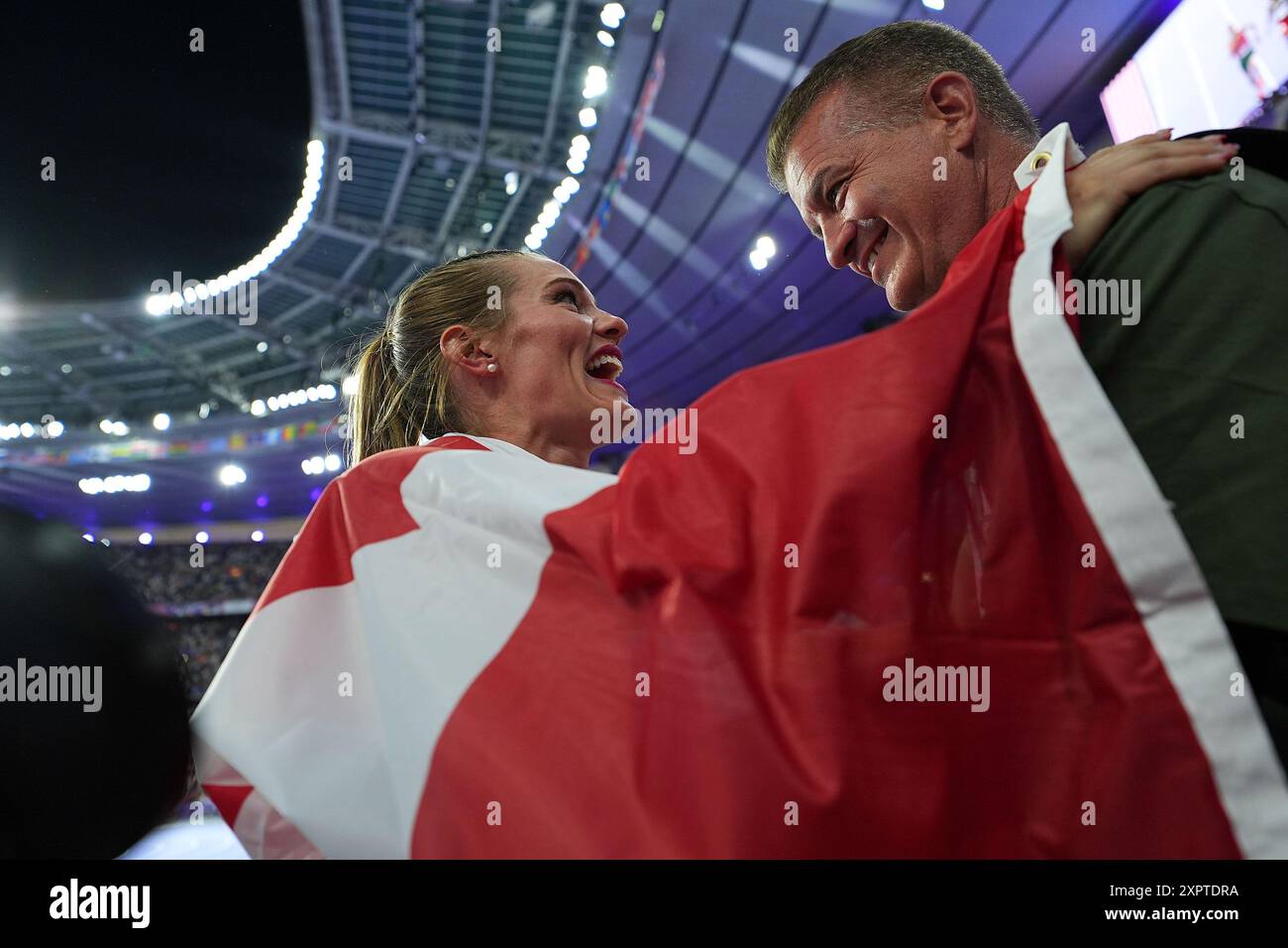 Paris, France. 7th Aug, 2024. Alysha Newman (L) of Canada celebrates ...