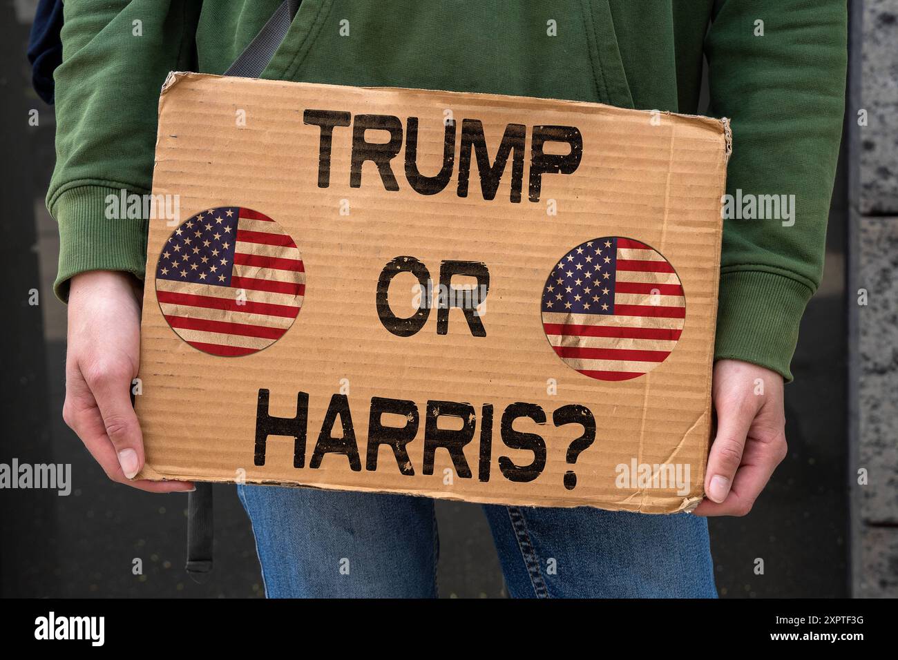 August 7, 2024: Woman holding a handmade sign with the inscription ...