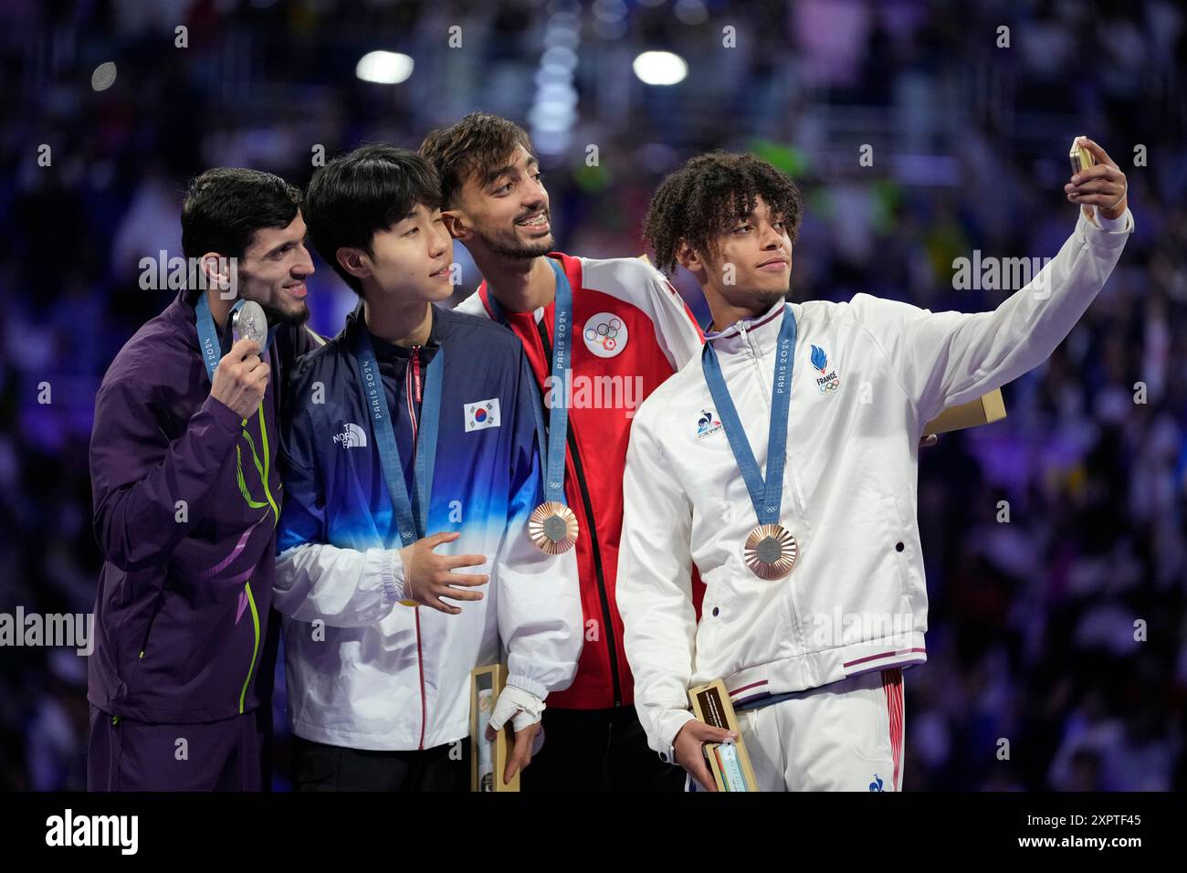 Korea's Taejoon Park, second left, winner of the gold medal in a men's ...