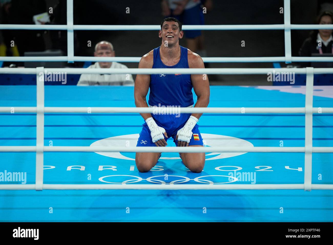 Spain's Ayoub Ghadfa celebrates after defeating France's Djamili-Dini ...