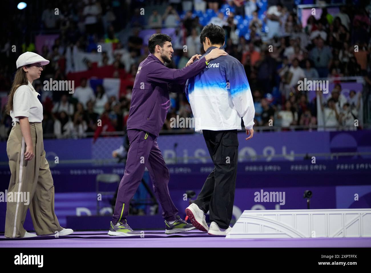 Korea's Taejoon Park, left, winner of the gold medal in a men's 58kg ...