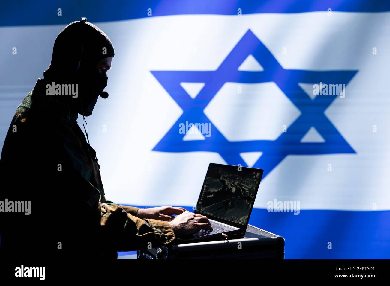 Mossad military expert using laptop, operating air defense system ...
