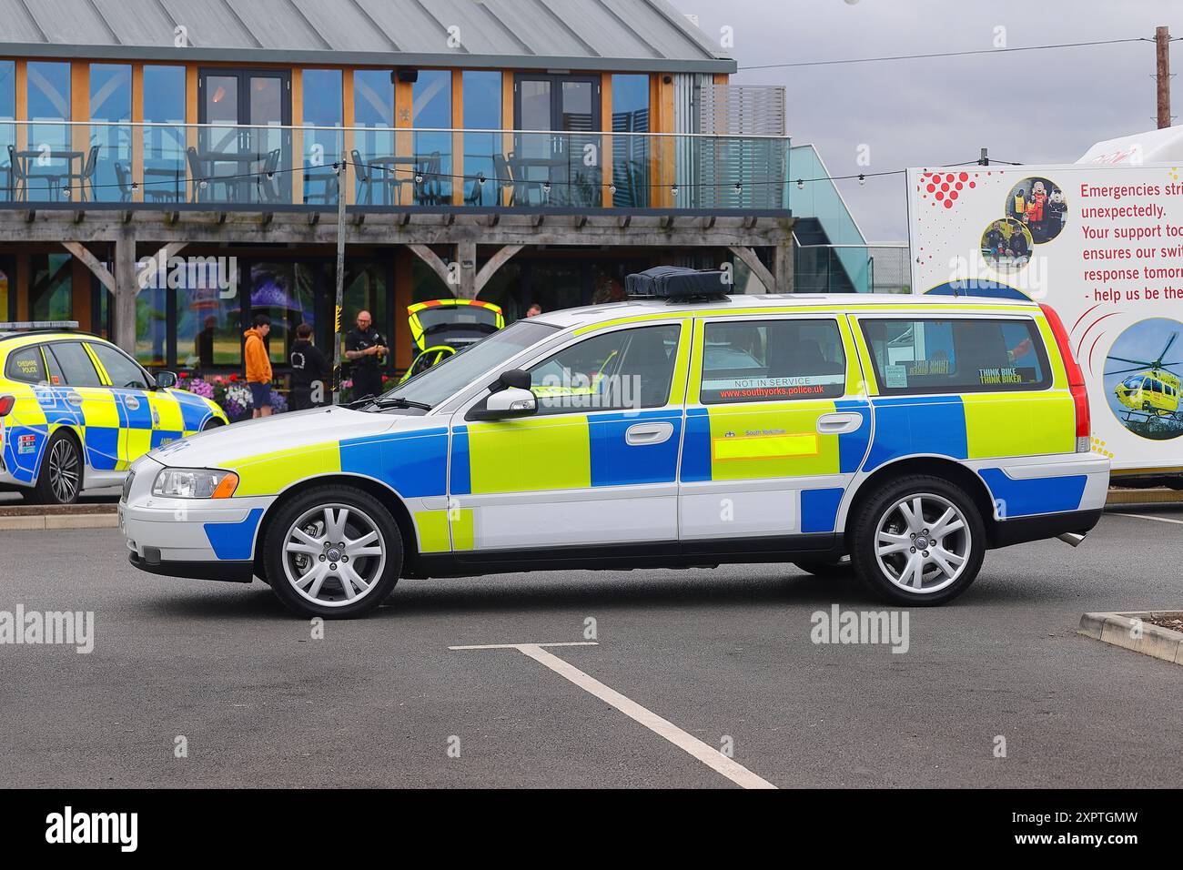 A retro police car arriving to the Cops & Cars Show at The Motorist in ...