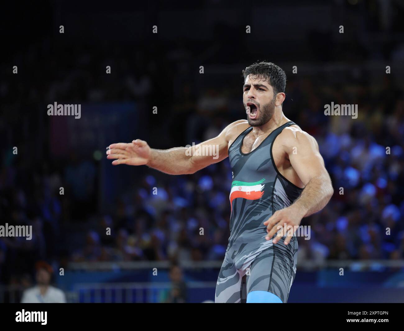 Iran's SARAVI Mohammadhadi reacts after winning the Men's Greco-Roman ...