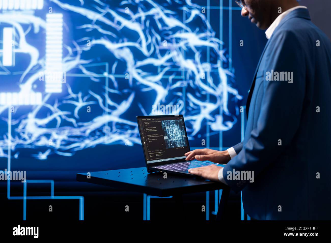 AI computer scientist using laptop device in high tech futuristic ...