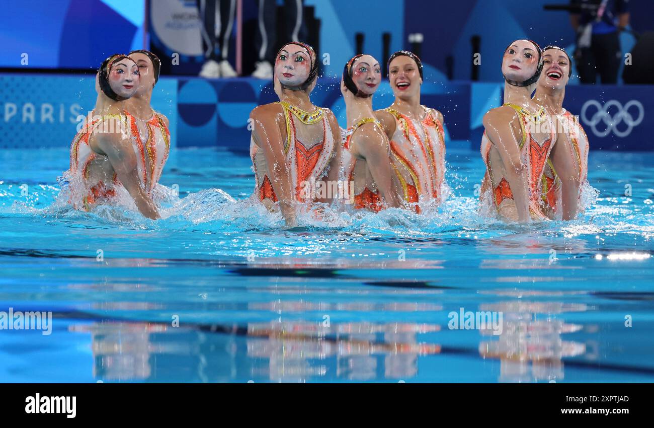 Members of Team France wear the swim caps displaying the face during an ...