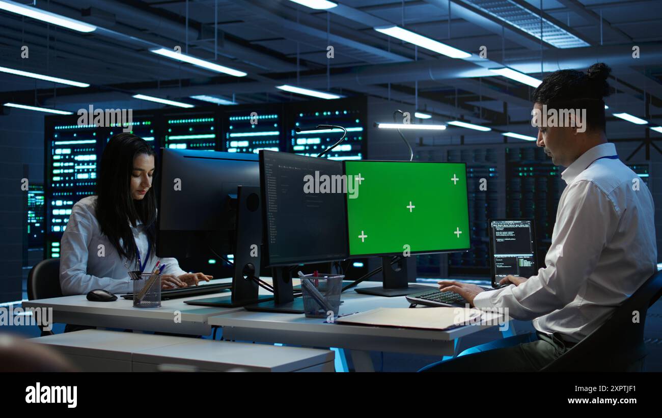 Programmer Overseeing Data Center Using Isolated Screen Computer Ensuring System Can Handle